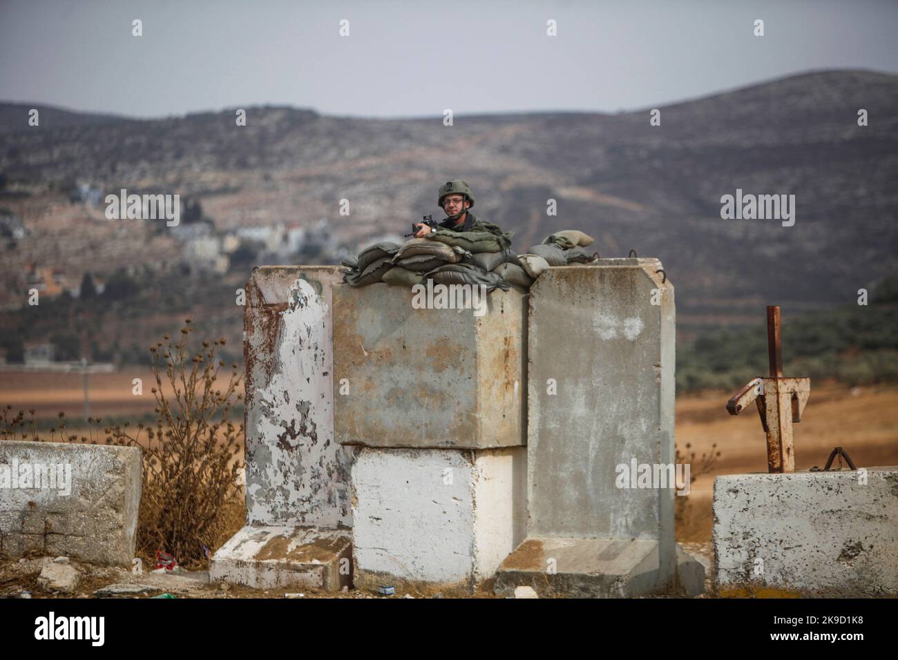 Nablus, Palestine. 26th Oct, 2022. An Israeli soldier seen guarding a ...