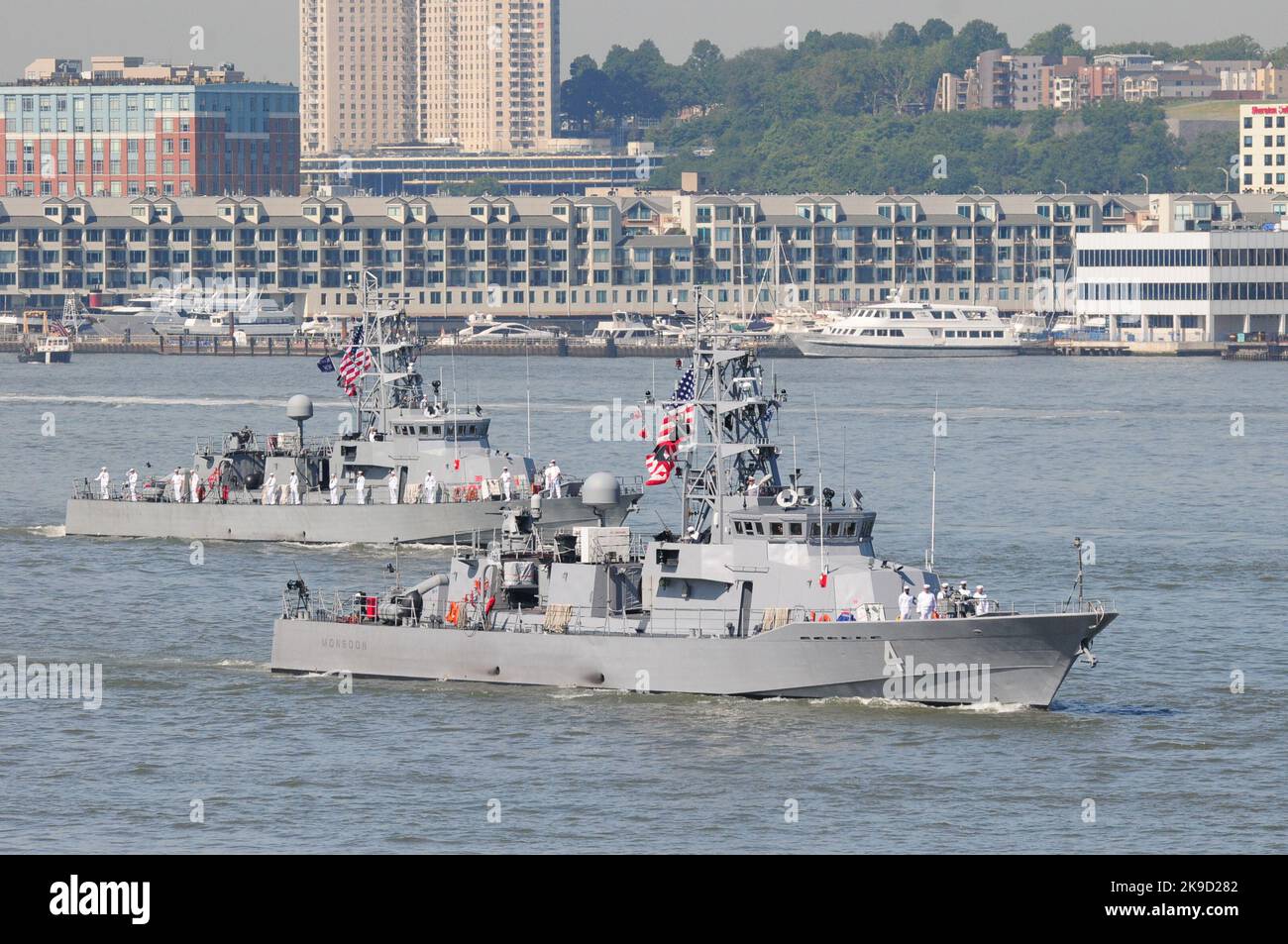 The Cyclone-class coastal patrol ships USS Tempest (PC 2), left, and ...