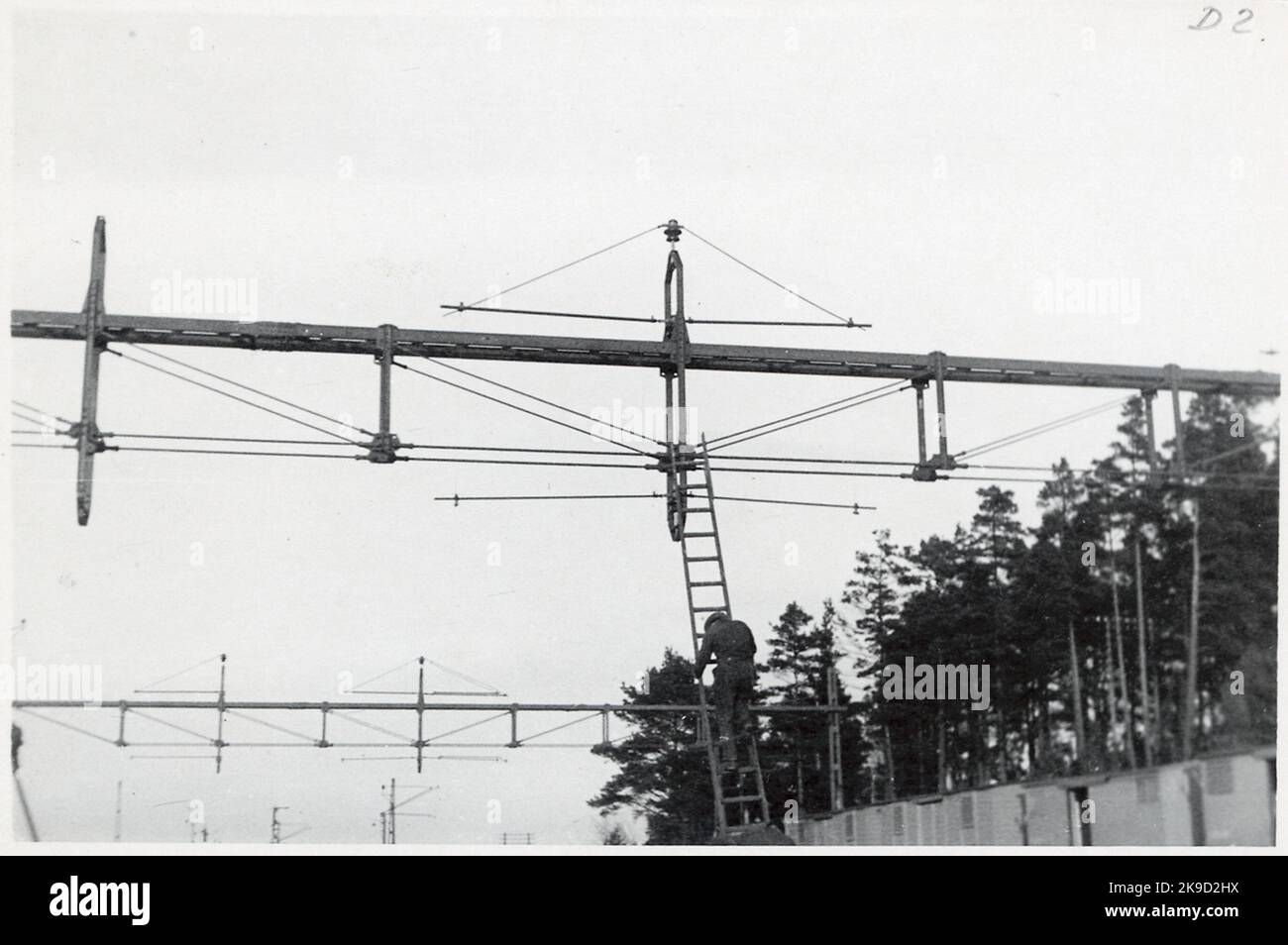 Assembly of an output on a contact line bridge Stock Photo - Alamy