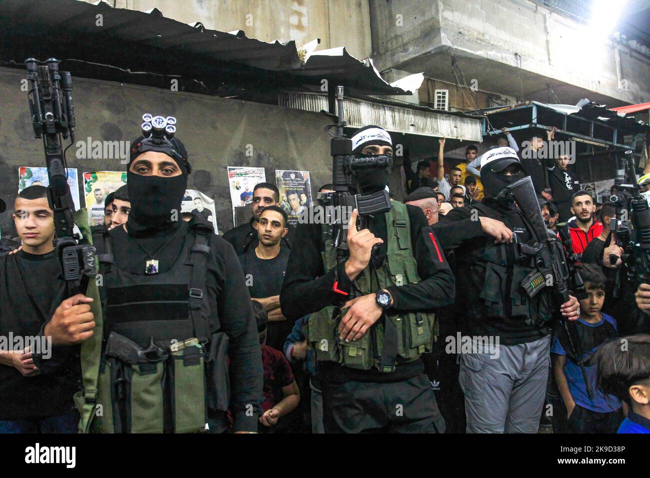 Masked Palestinian gunmen appeared carrying their weapons while ...
