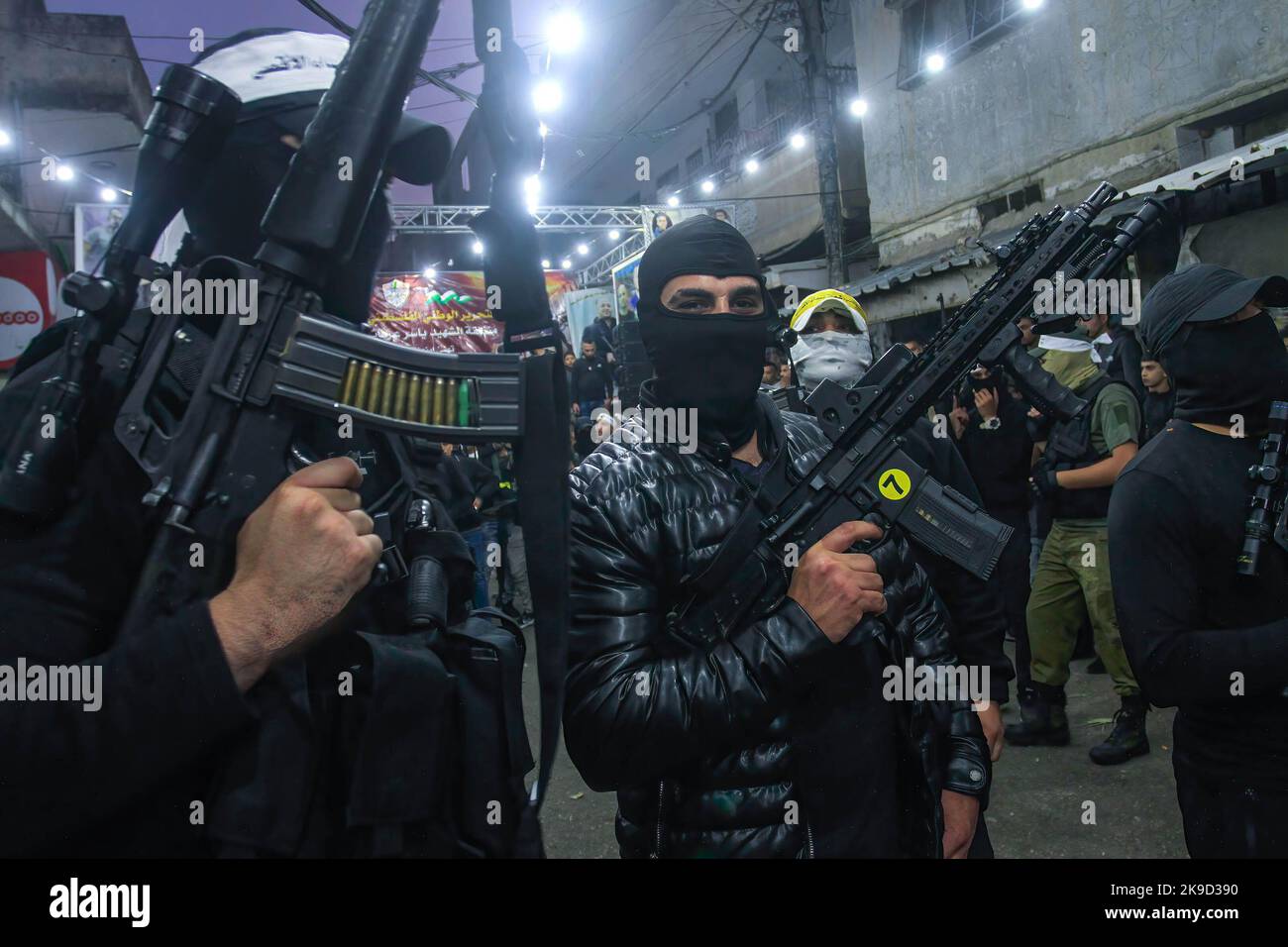 Masked Palestinian gunmen appeared carrying their weapons while ...