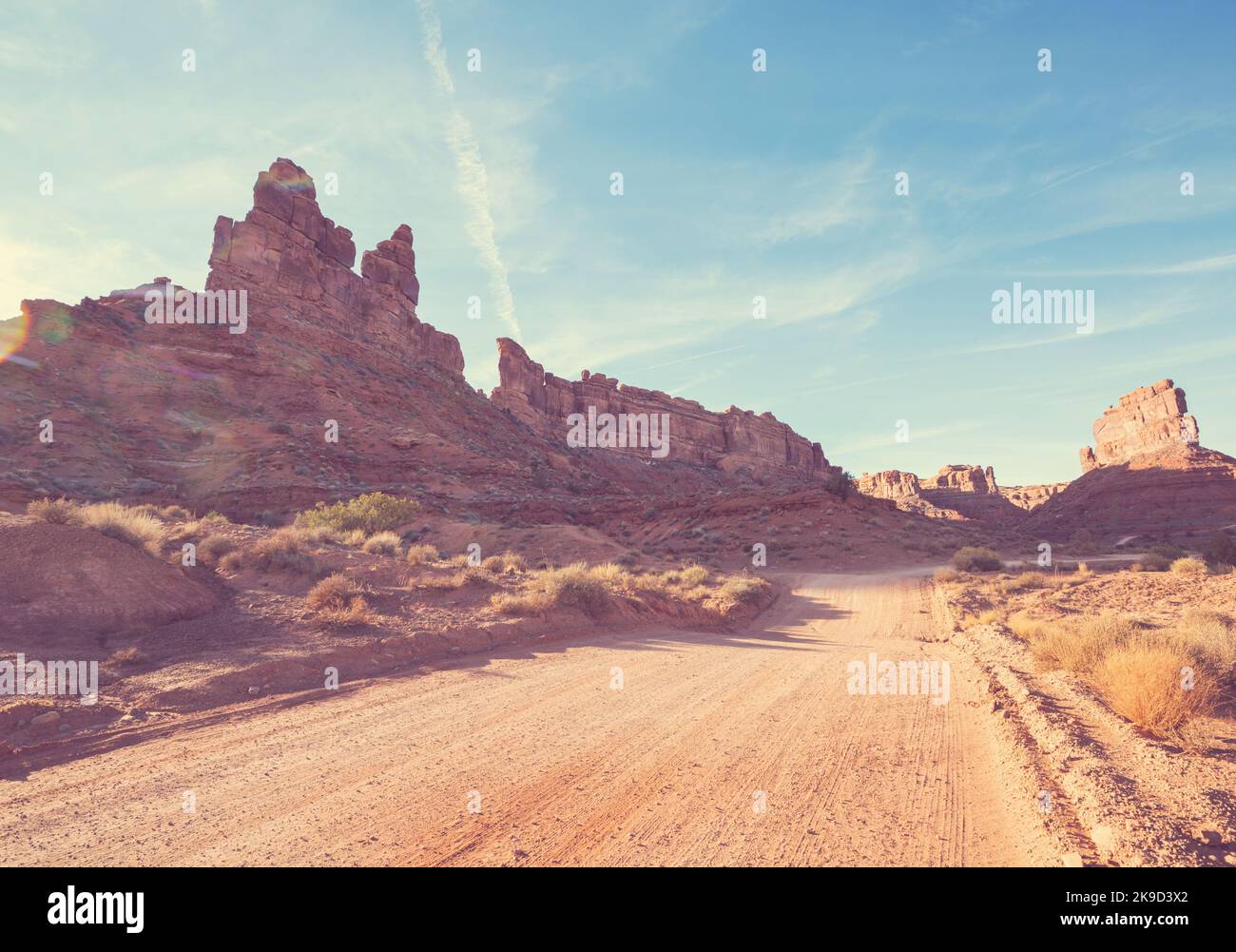 Valley of the Gods rock formation with Monument Valley at sunrise Stock ...