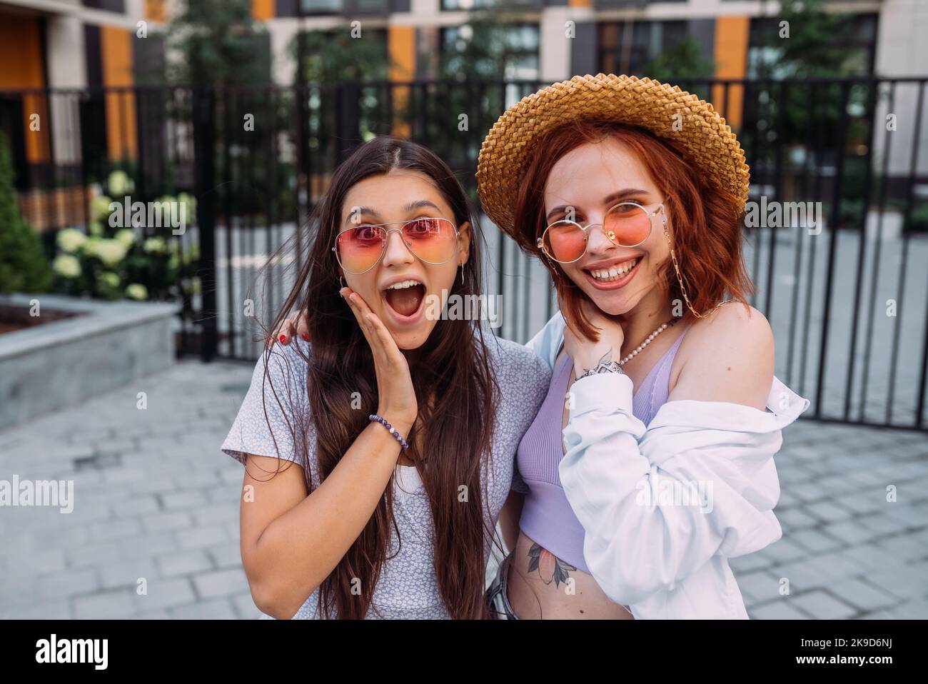 Two girlfriends having fun and fooling around Stock Photo - Alamy