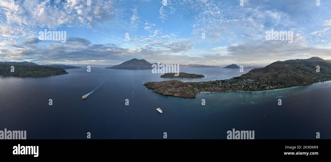 Sunrise illuminates Alor and volcanos in the Pantar Strait, Indonesia ...