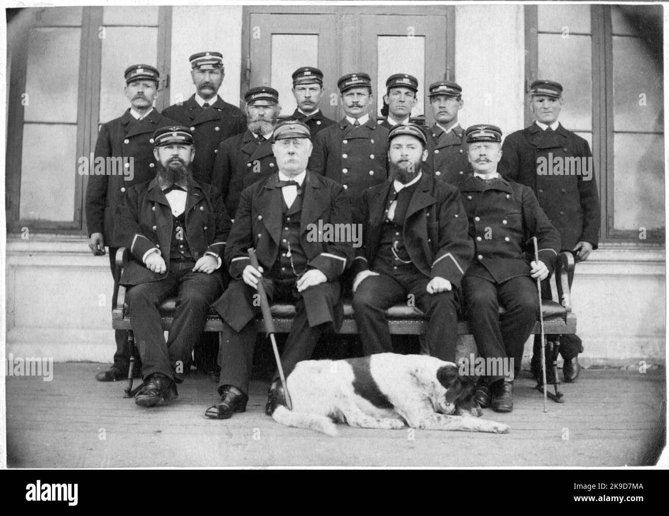 Station inspector Johan Peter Lilljedahl together with staff and dog ...
