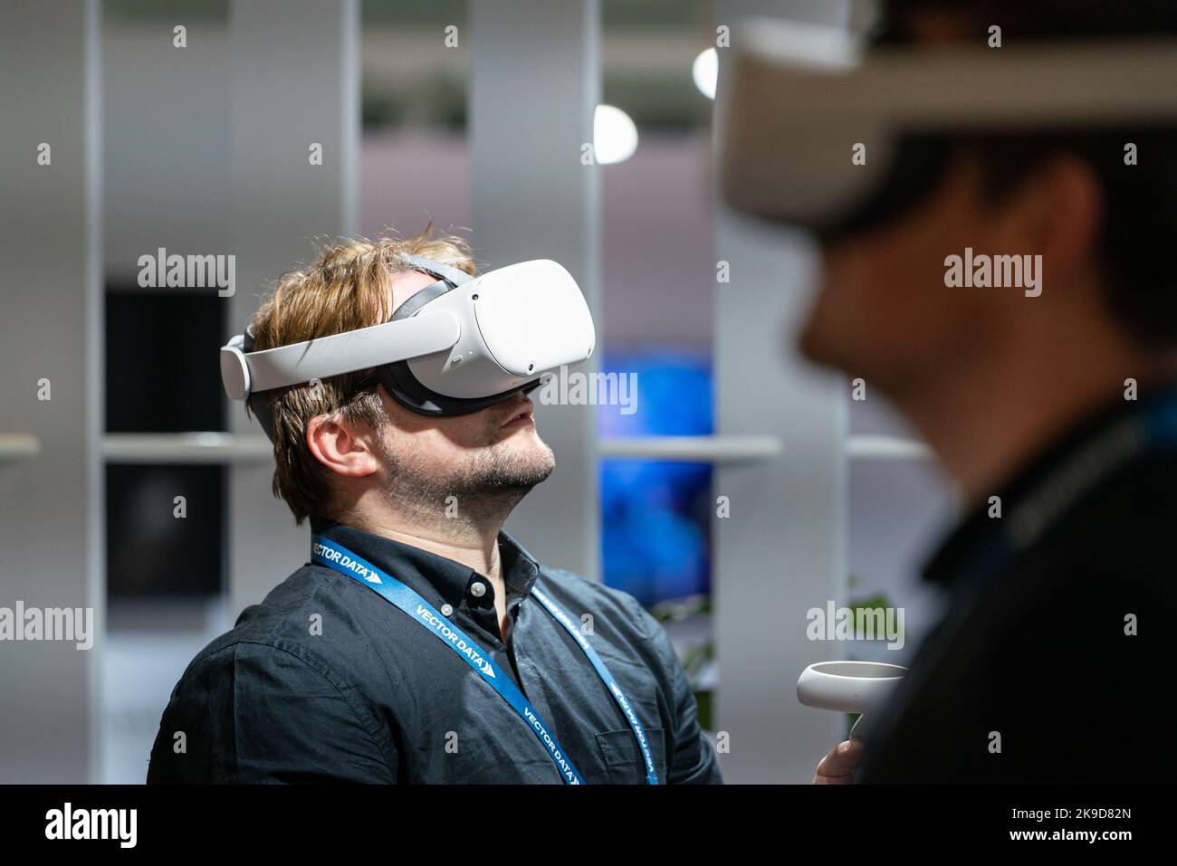 Madrid, Spain. 27th Oct, 2022. Men seen wearing Oculus VR Inc. virtual ...