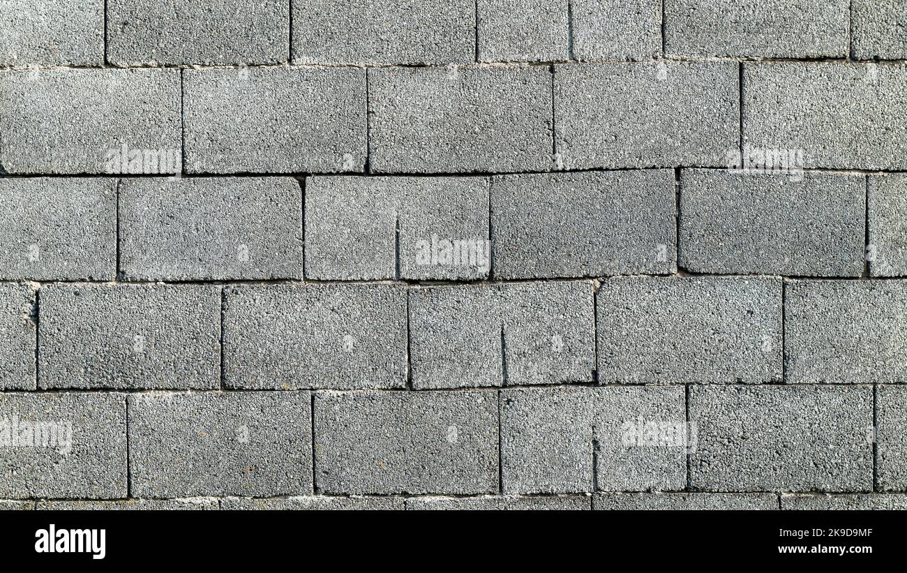 Old concrete block wall, background Stock Photo - Alamy