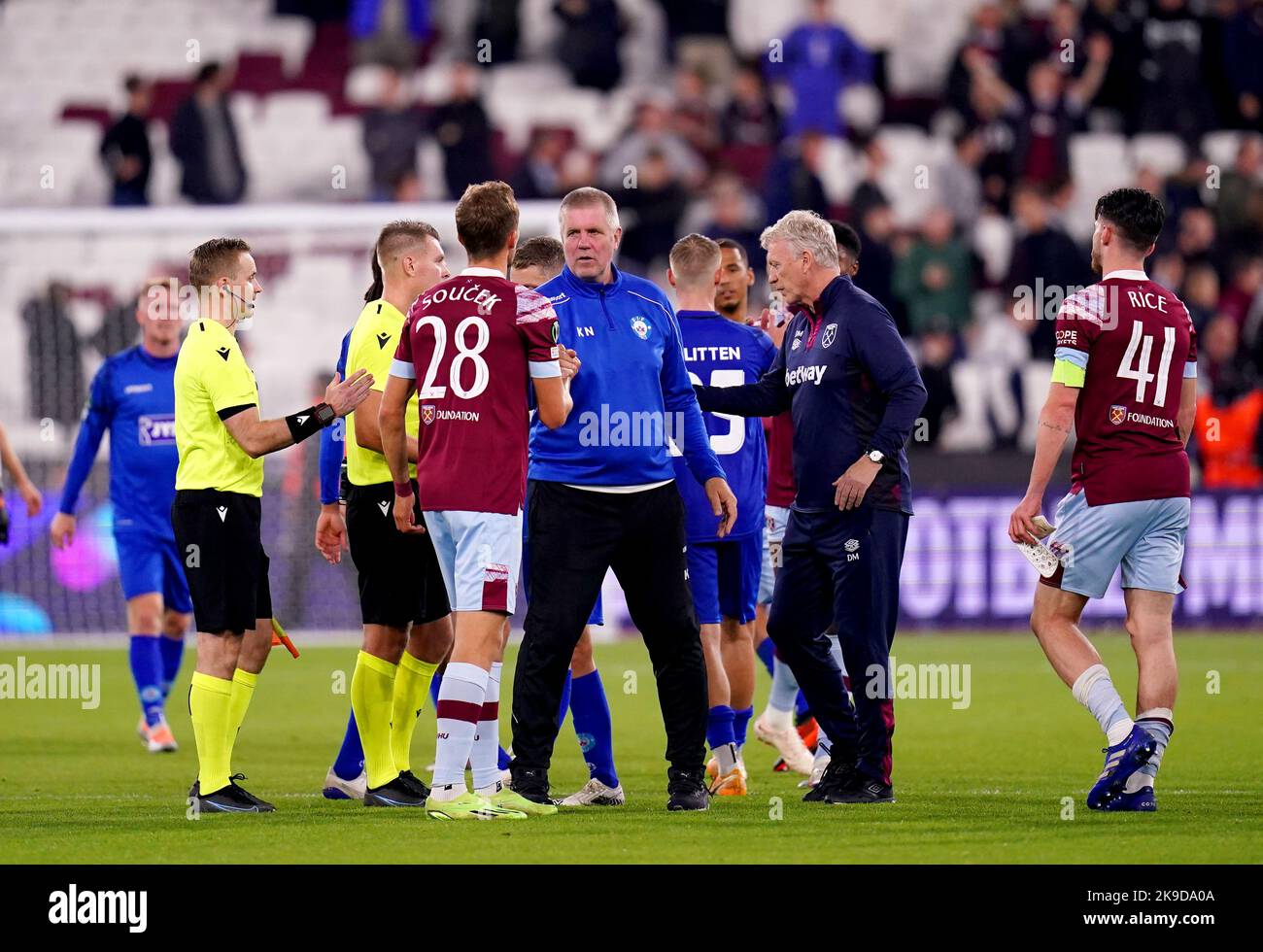 Silkeborg IF manager Kent Nielsen shakes hands with West Ham United's ...