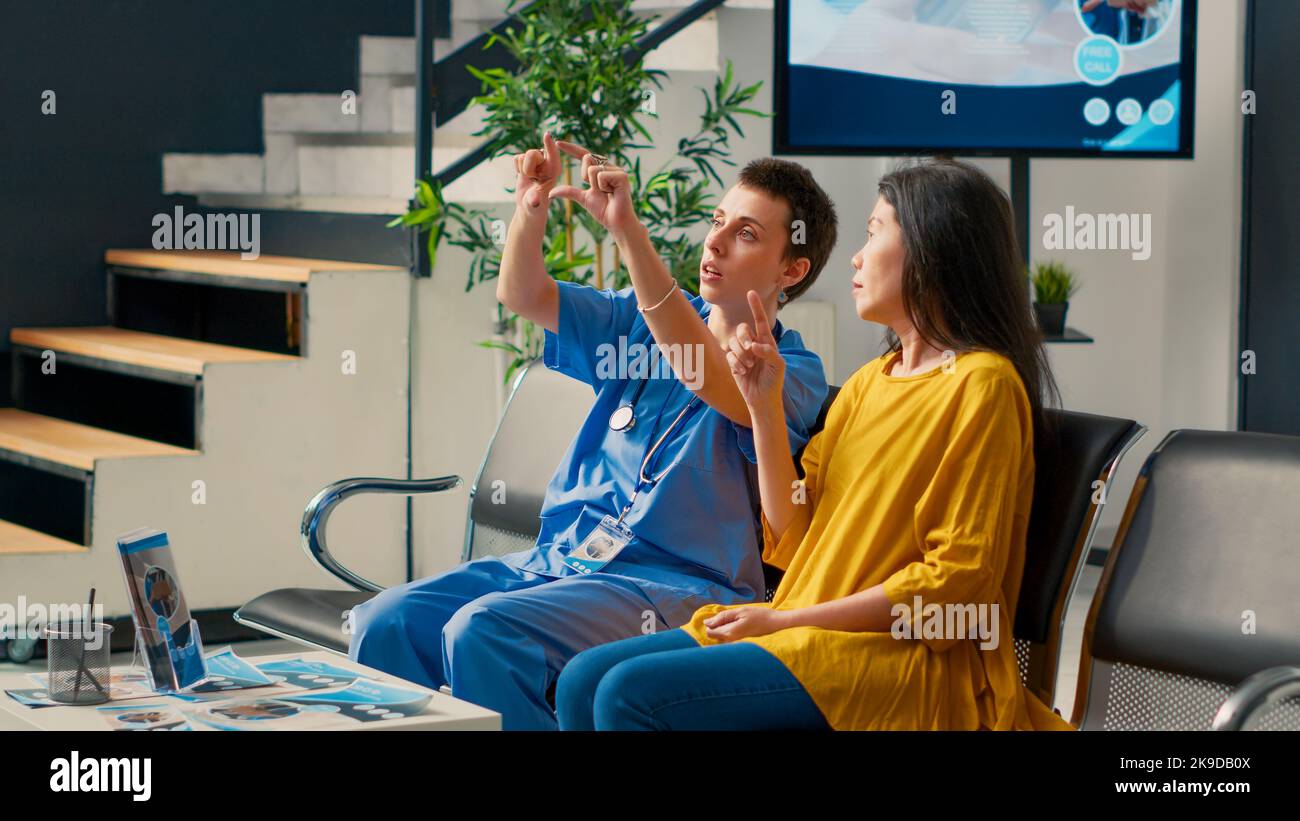 Diverse people analyzing high tech 3d hologram at medical facility ...