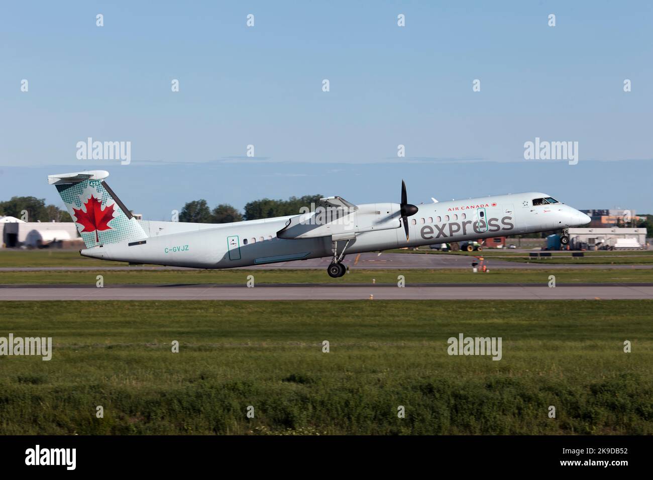 An Air Canada Express (Jazz Aviation) Bombardier Dash 8-400 taking off ...
