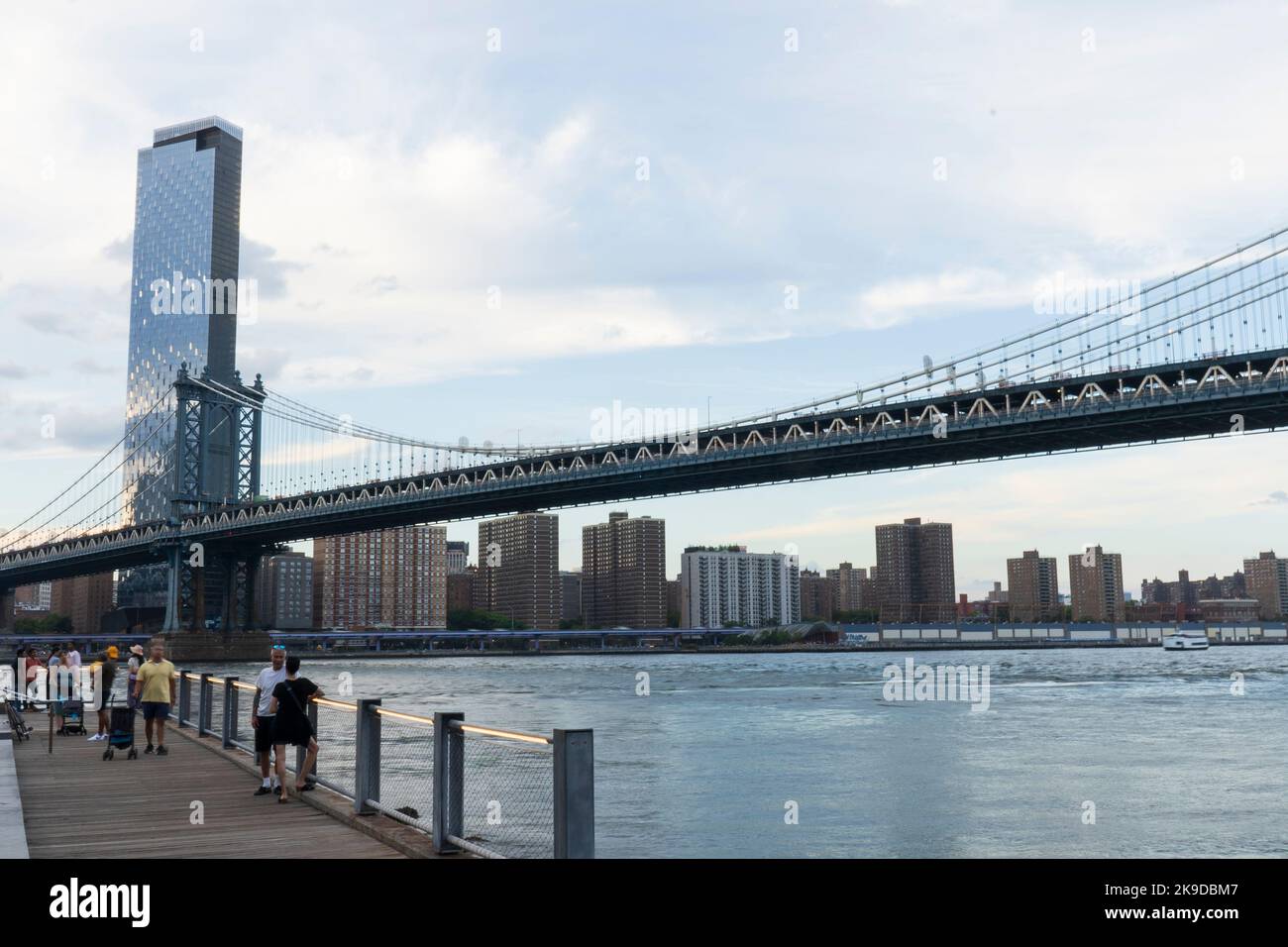 Manhattan Bridge seen from Empire Fulton Ferry promenade area in ...