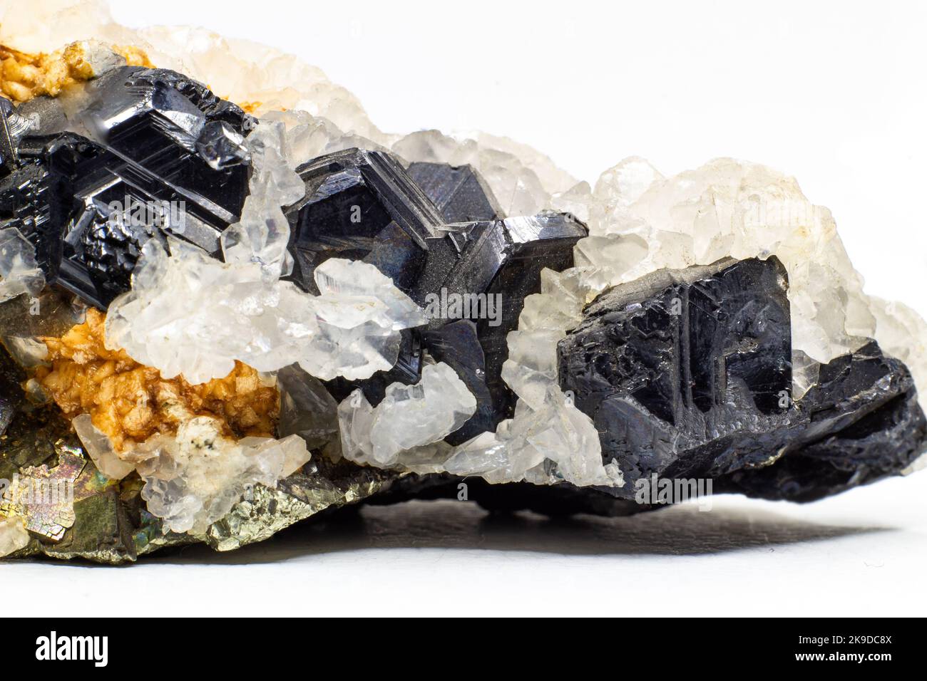 A crystal and stone cluster with clear white quartz, silver metallic ...