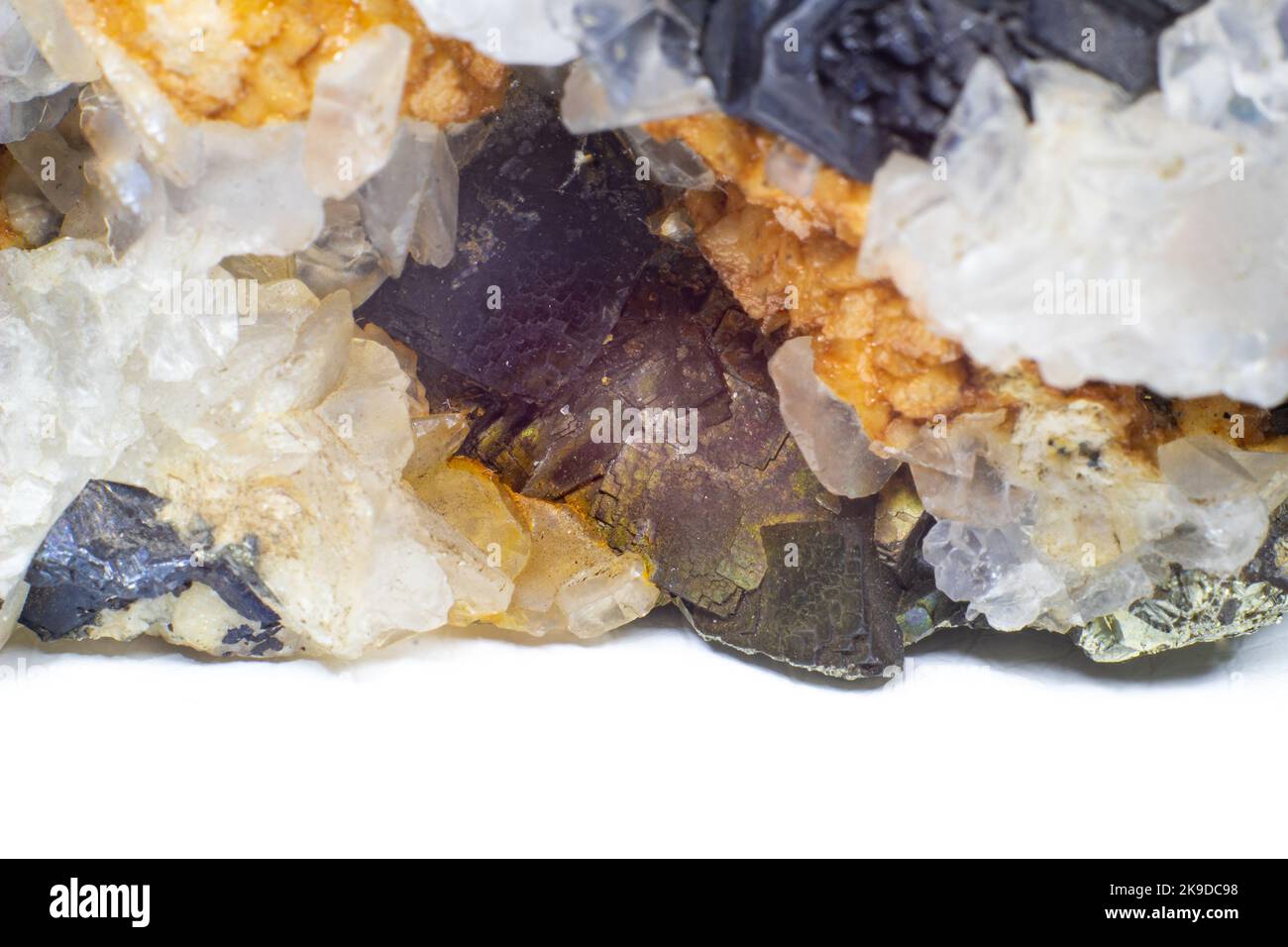 A crystal and stone cluster with clear white quartz, silver metallic ...