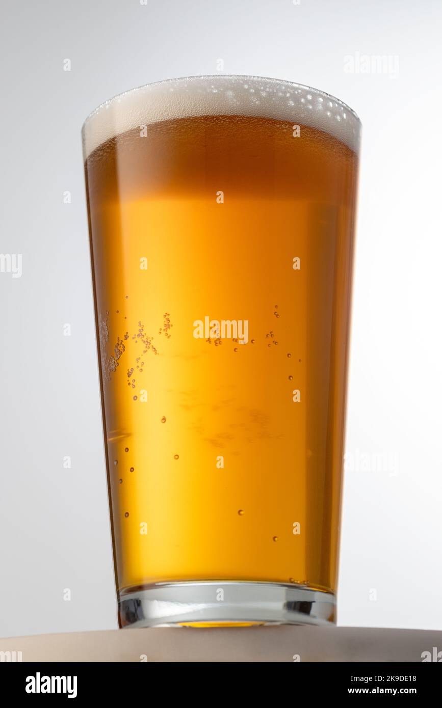 Glass of beer on bar hi-res stock photography and images - Alamy