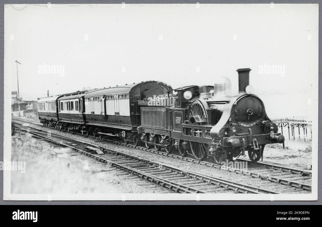 Steam locomotive with passenger car Stock Photo - Alamy