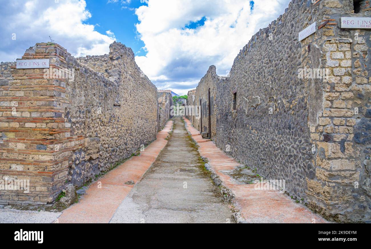 Pompeii Italy a site visited by many tourists where much evidence has ...