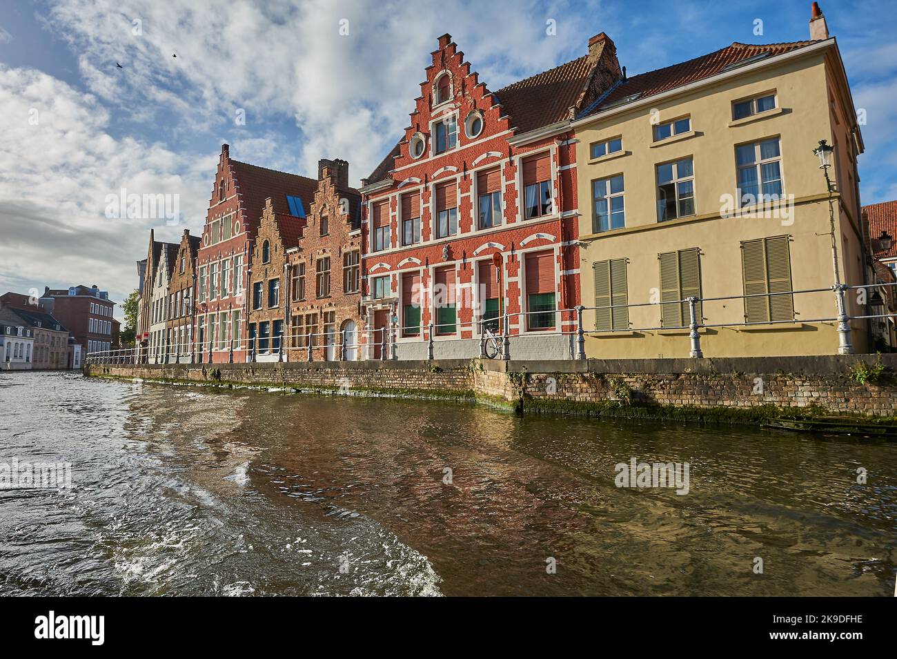 Ornate Flemish architecture on buildings lining the Sint Annarei canal ...