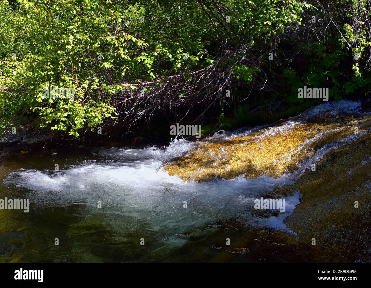 Horsetail Falls cascade down the cliffs in Lone Peak Wilderness along ...