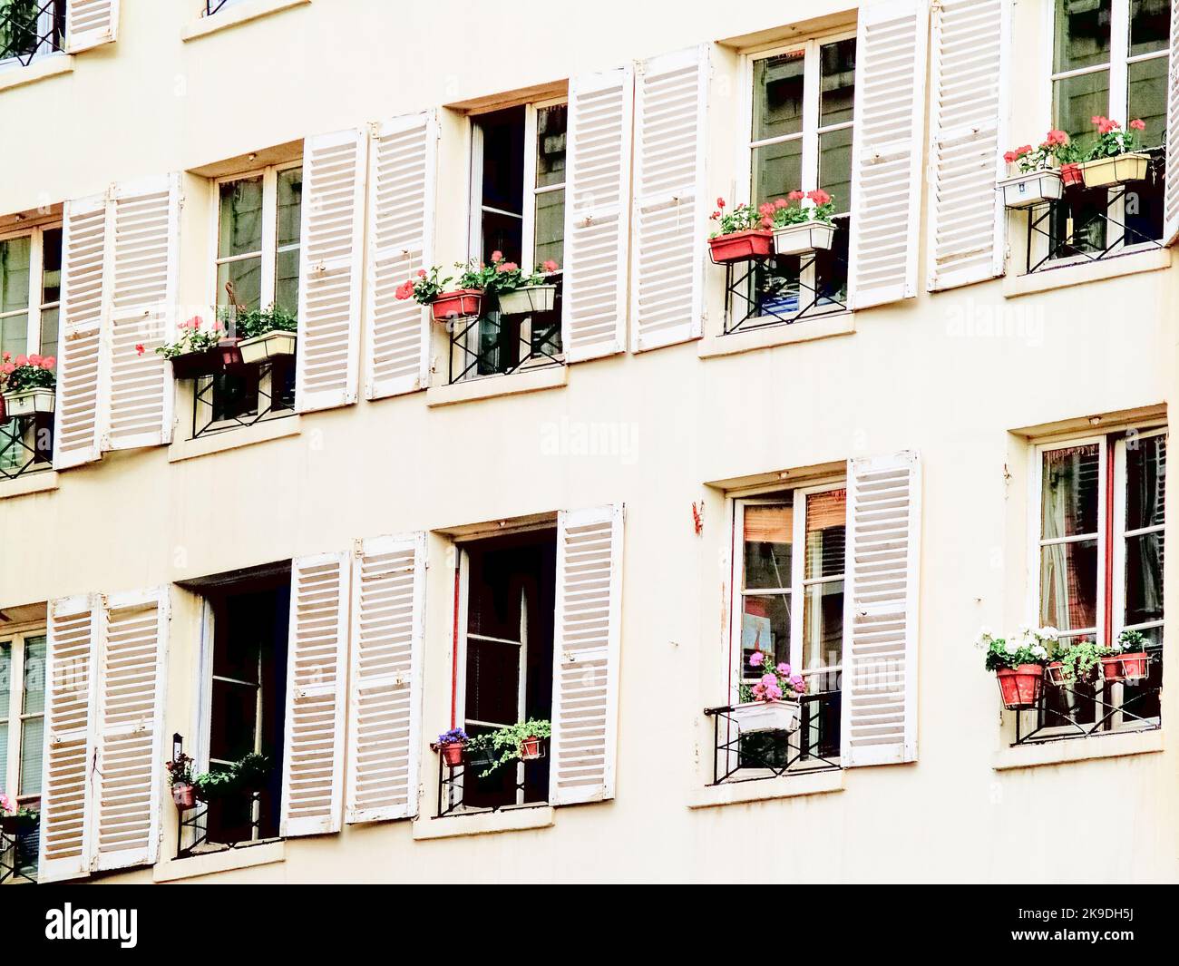 Rows of shuttered windows in typical multi-level inner-city apartments ...