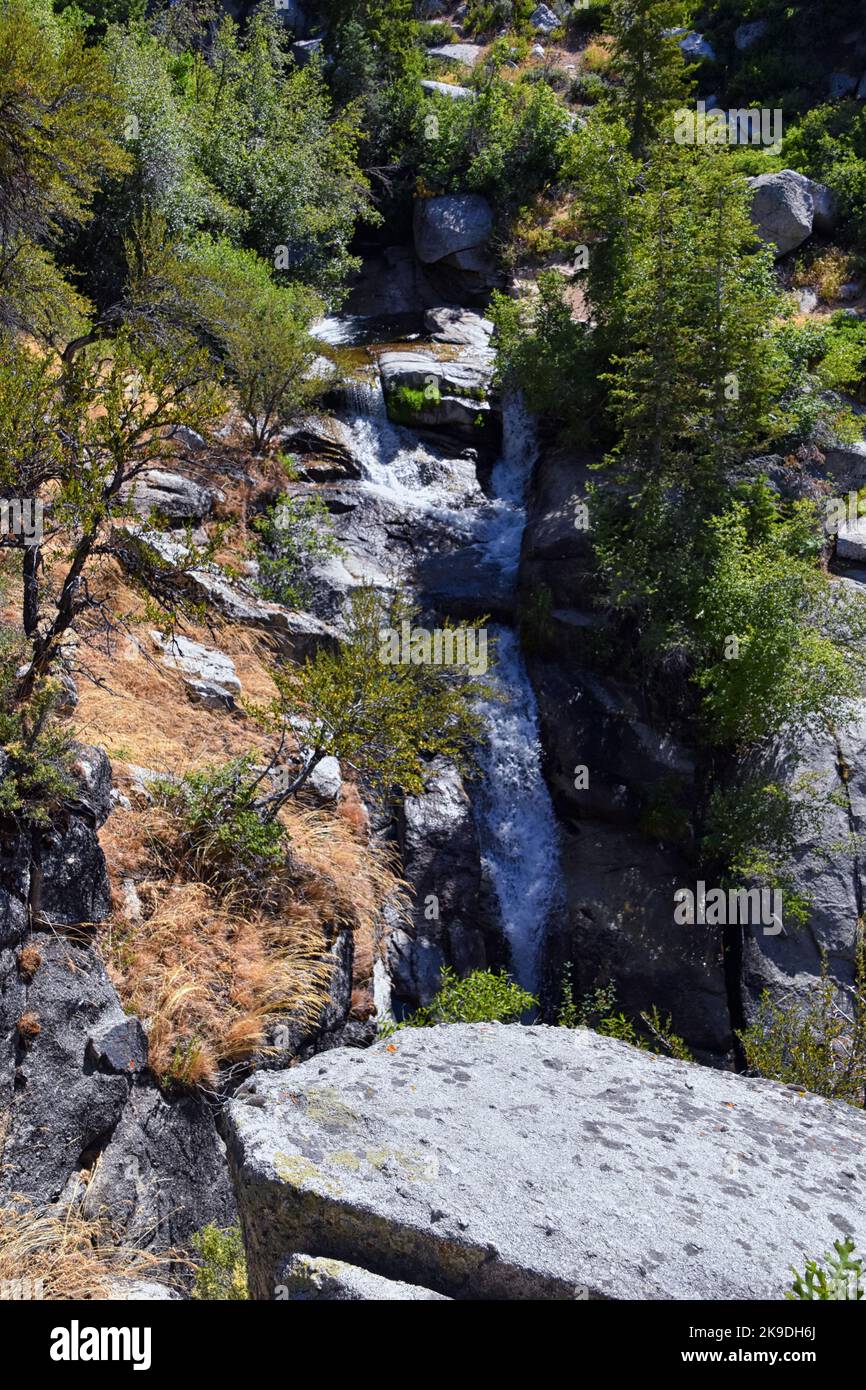 Horsetail Falls cascade down the cliffs in Lone Peak Wilderness along ...