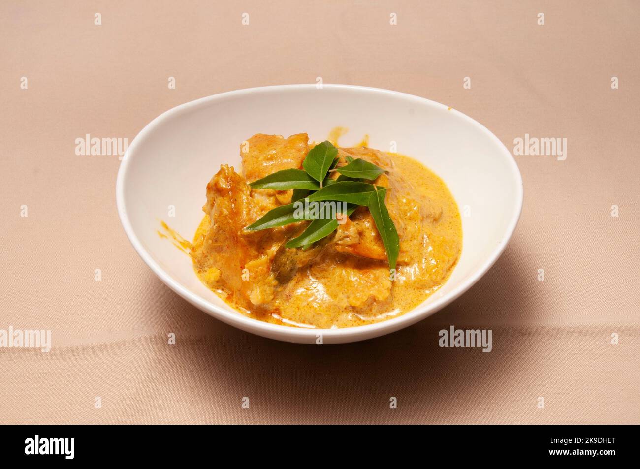Delicious Indian dish known as fish malabar curry Stock Photo - Alamy