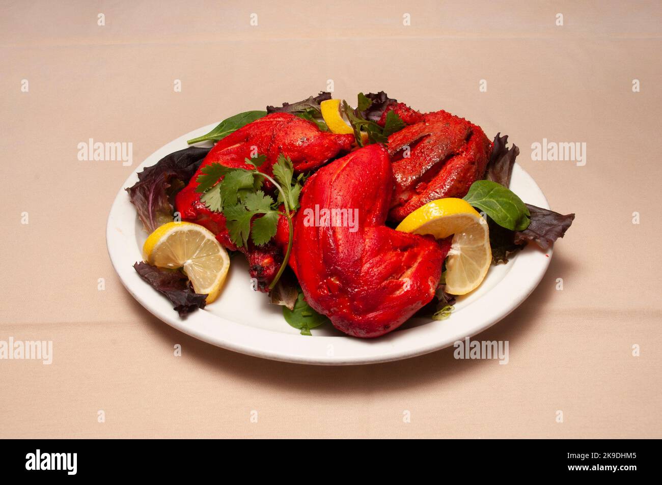 Traditional and authentic indian cuisine known as tandoori chicken ...