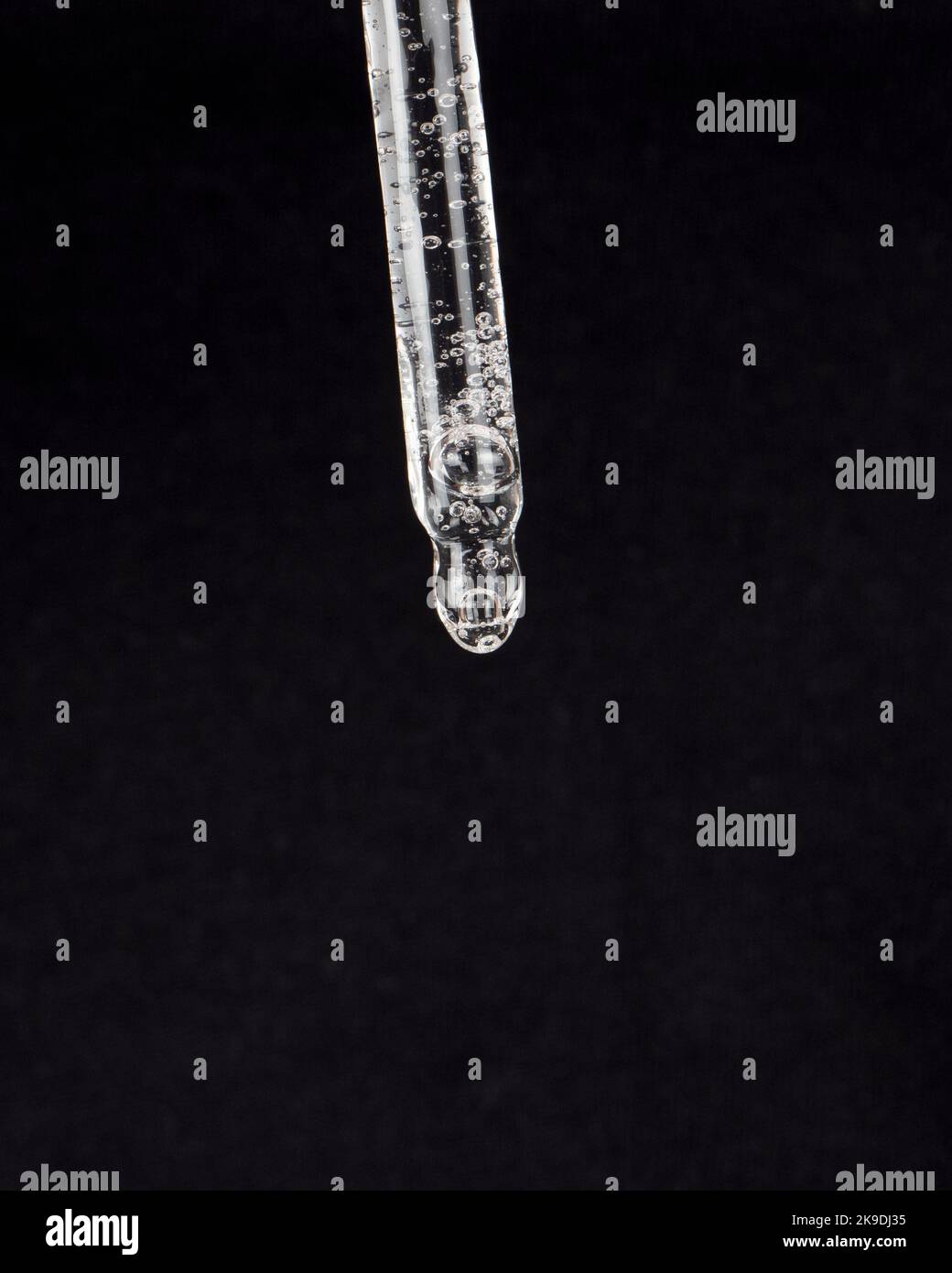 pipette with medicine on a black background, cannabis extract drop ...