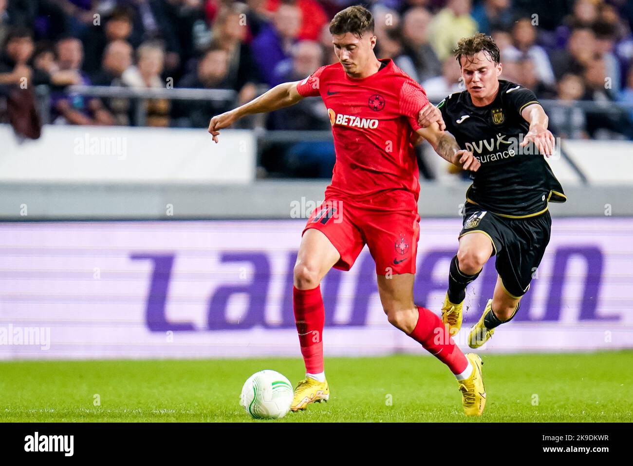BRUSSELS, BELGIUM - OCTOBER 27: David Miculescu of FCSB is challenged ...