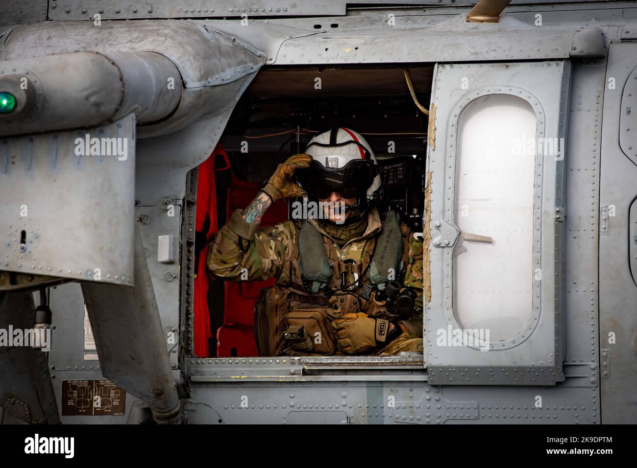 Naval Air Crewman 1st Class Bobby Nilson, assigned to the “Tridents” of ...