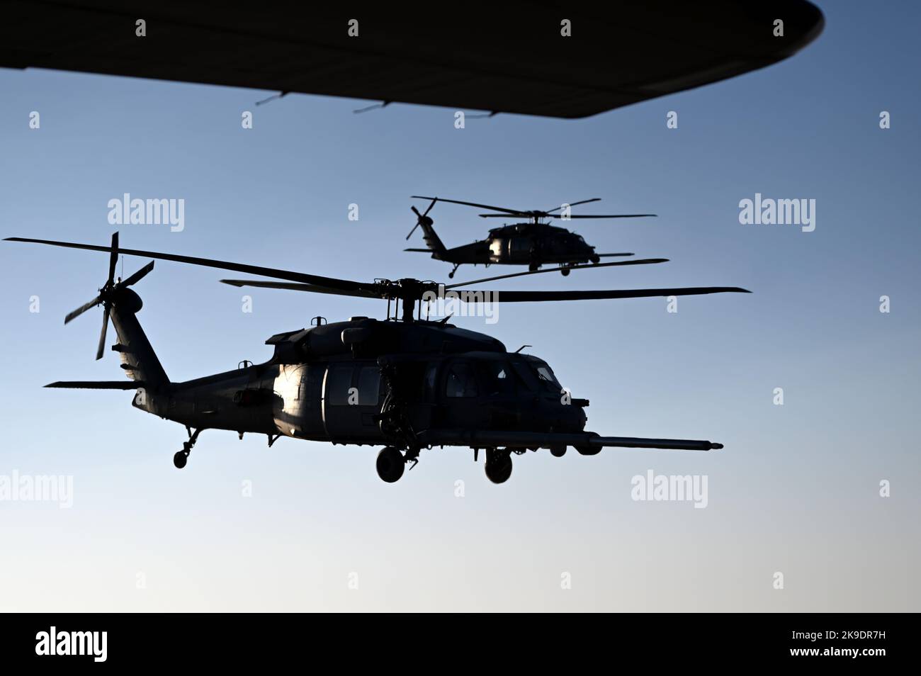 Two U.S. Air Force HH-60G Pave Hawks and a HC-130J Combat King II ...