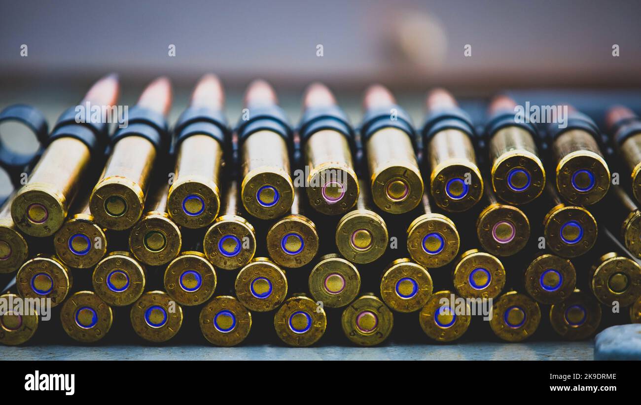 Ammunition is prepared for a .50 caliber machine gun during a live-fire ...