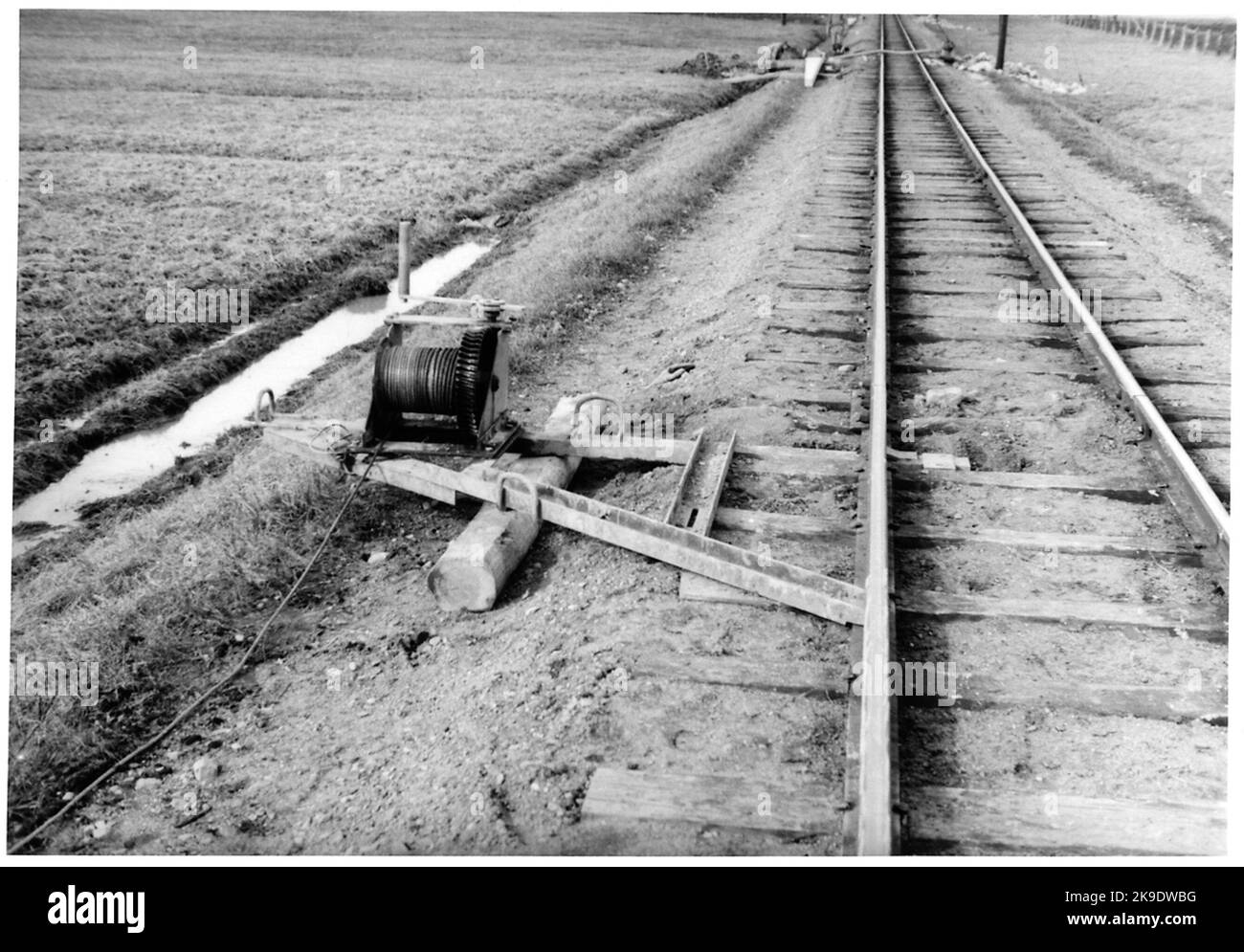 Detail, while working on the raising of concrete poles Stock Photo - Alamy