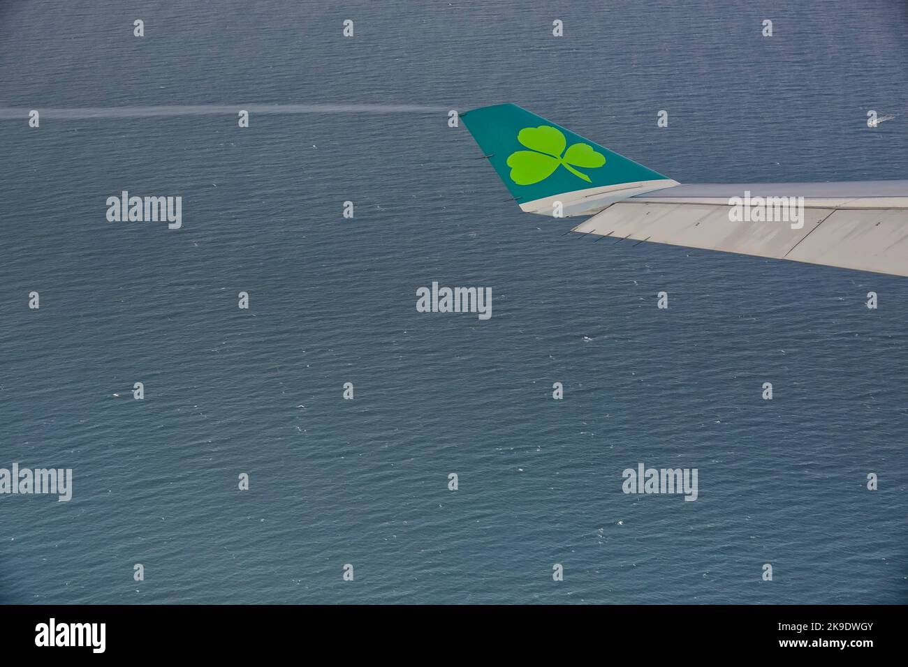 The Irish clover leaf symbol of an Aer Lingus A 330 forms a vapour jet ...