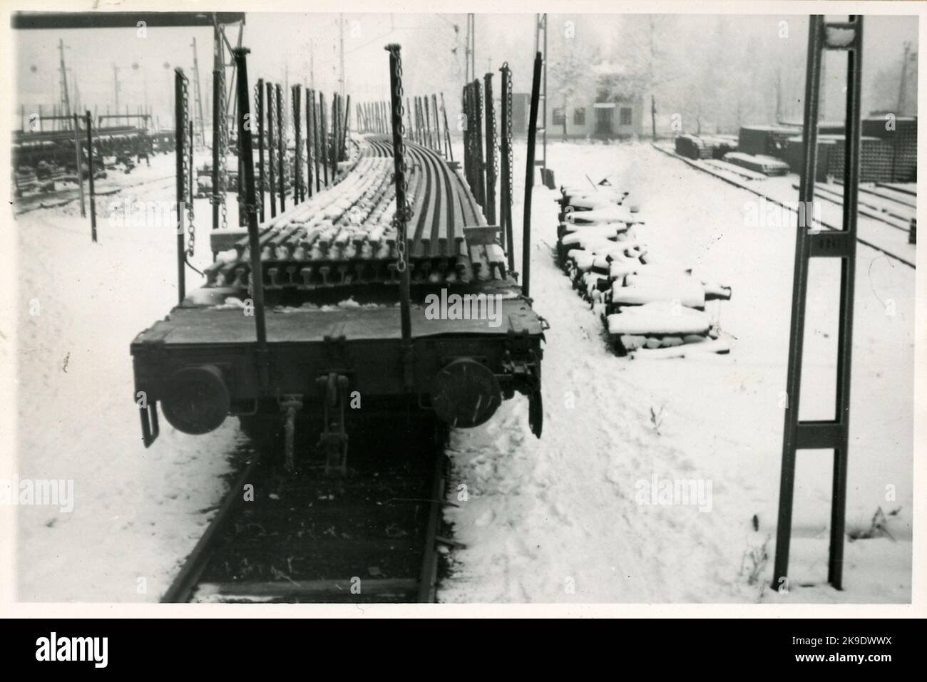 Freight carriage of rails Stock Photo - Alamy