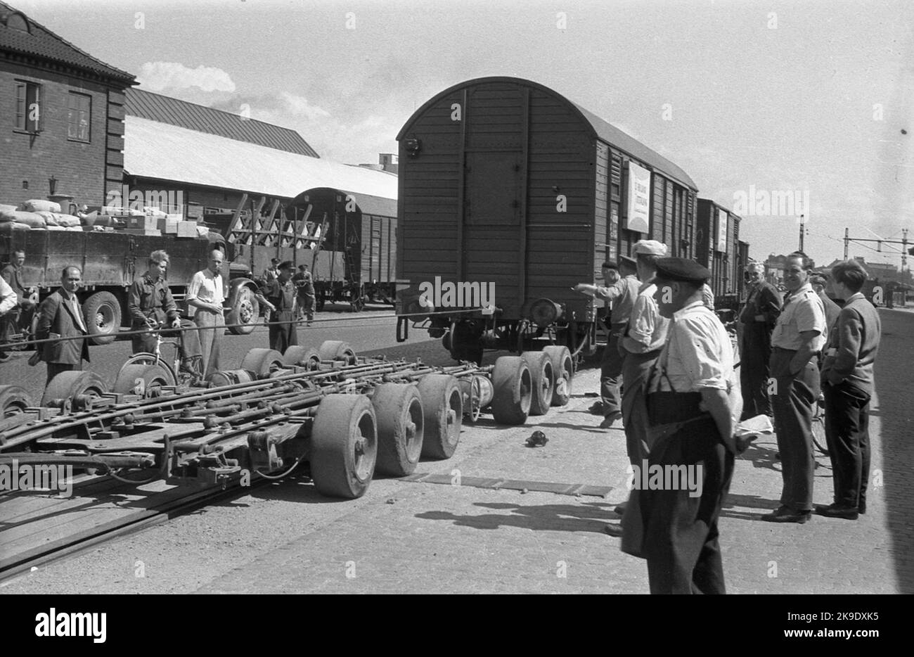 Freight wagon is loaded on carriage Stock Photo - Alamy