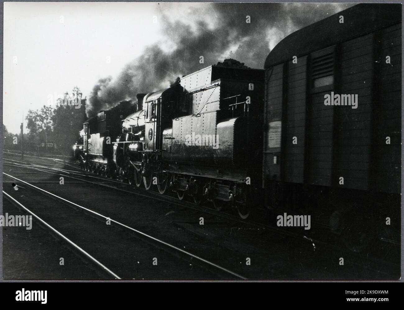 Double SJ B locomotive with passenger trains starts its journey north ...