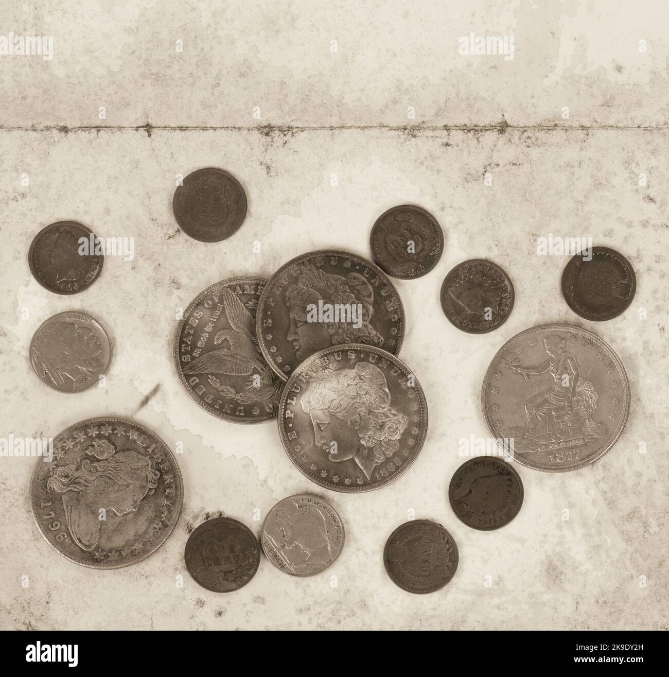 Unique vintage collection United States coins on faded paper background ...