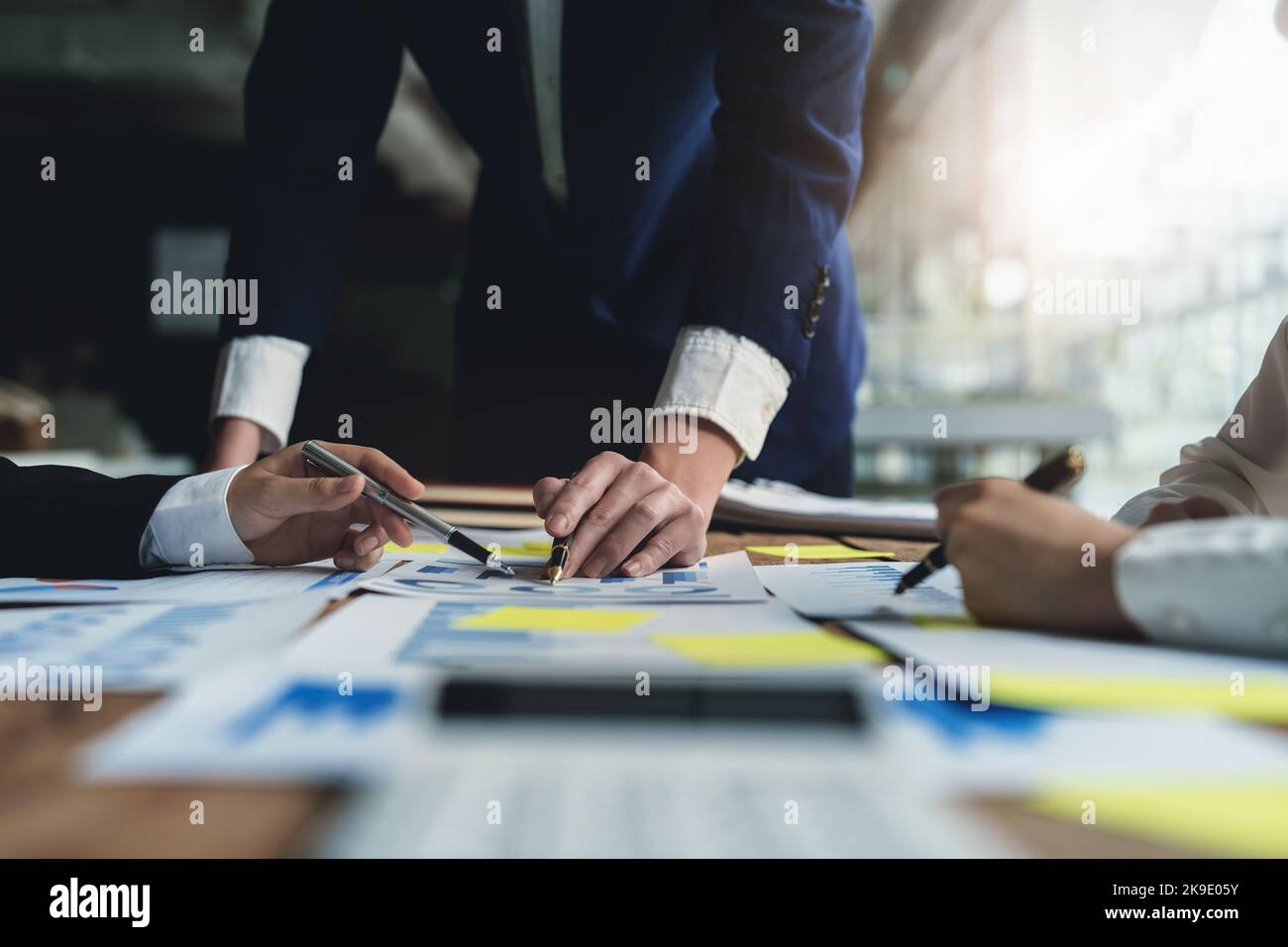 Male businessman pointing to take summarizing marketing strategy ...