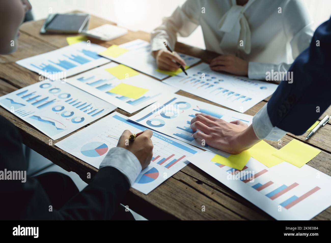 Male businessman pointing to take summarizing marketing strategy ...