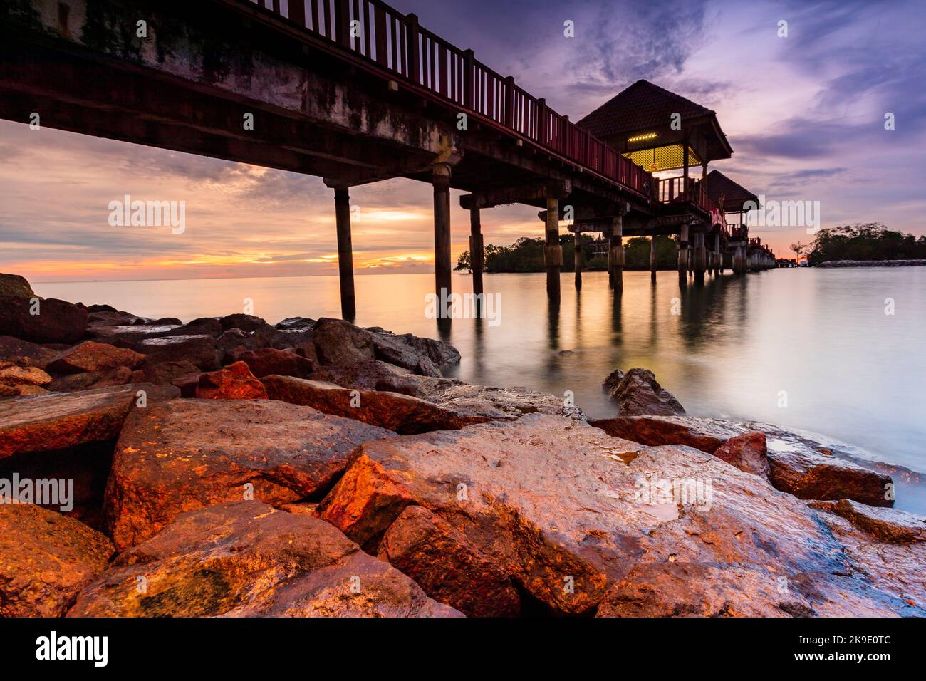 Cahaya Negeri Beach Jetty during Sunset Stock Photo - Alamy