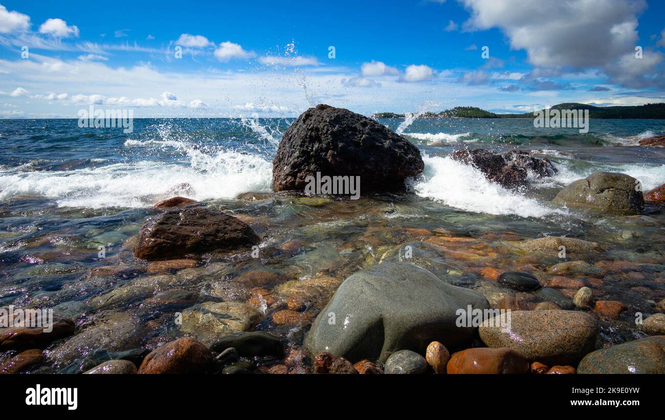 Waves Clashing behind a Volcanic Rock at Gargantua South Campsite, Lake ...