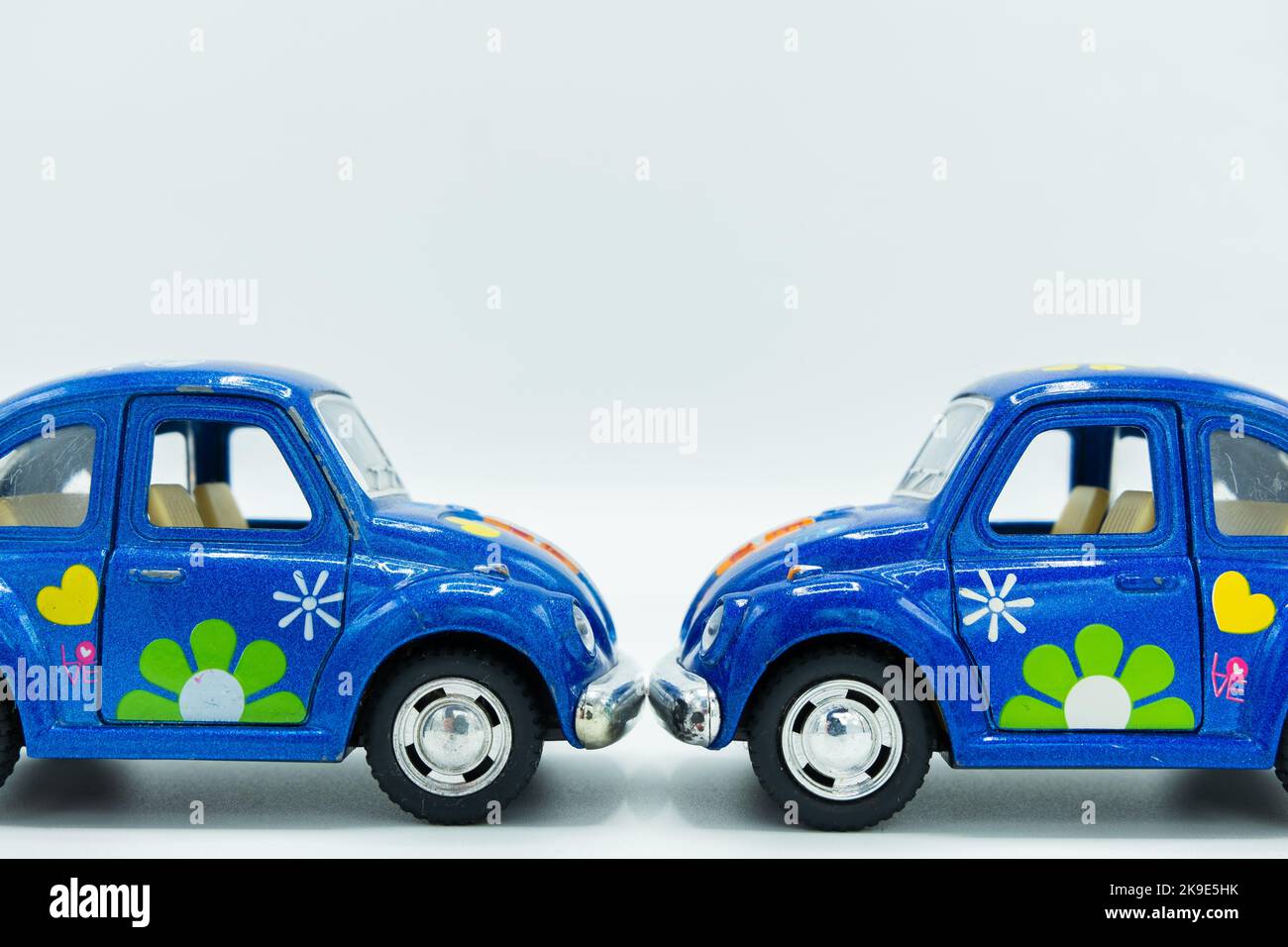 Blue vintage car with colorful flowers paint Stock Photo - Alamy