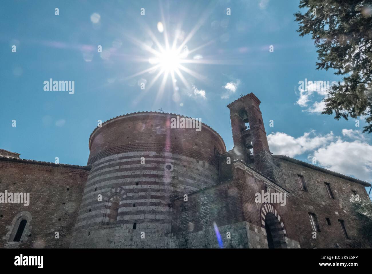 The summer sun on a medieval building in Tuscany Stock Photo - Alamy