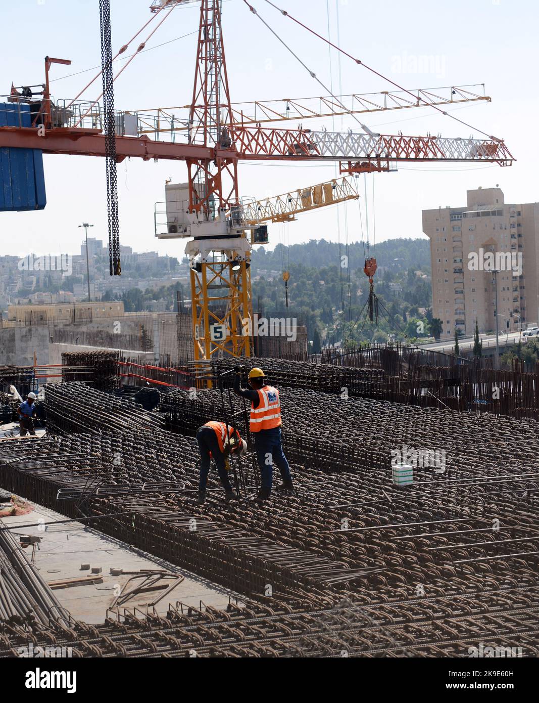 Construction workers working at the new city entrance project in ...