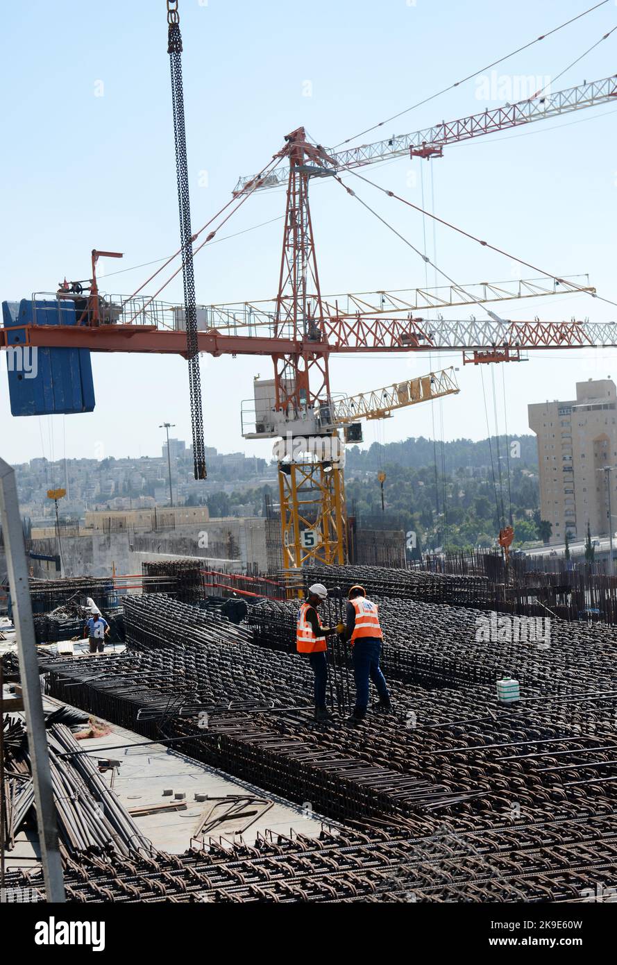 Construction workers working at the new city entrance project in ...