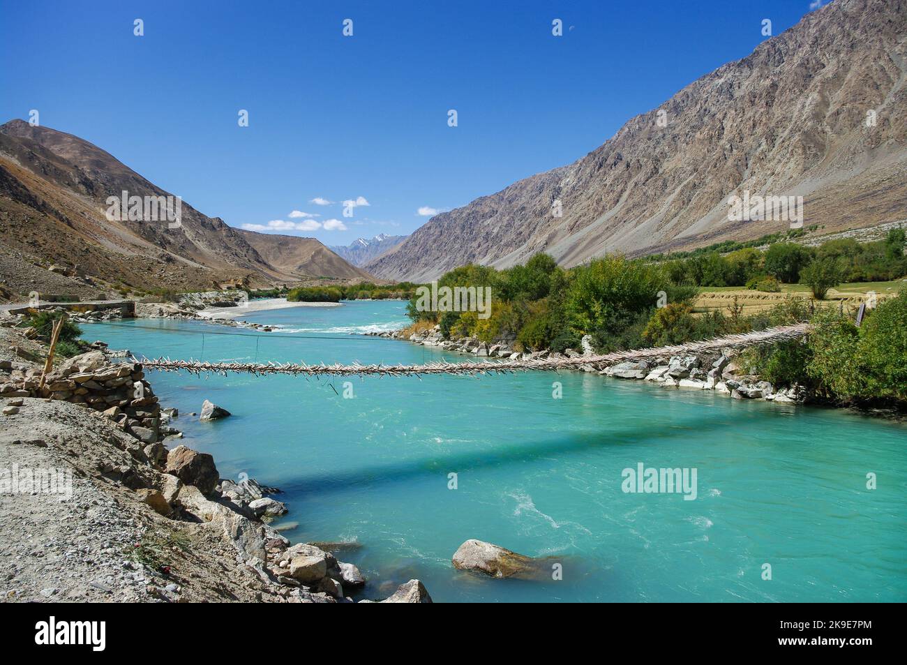 Colorful autumn landscape view of rural Gunt river valley with ...