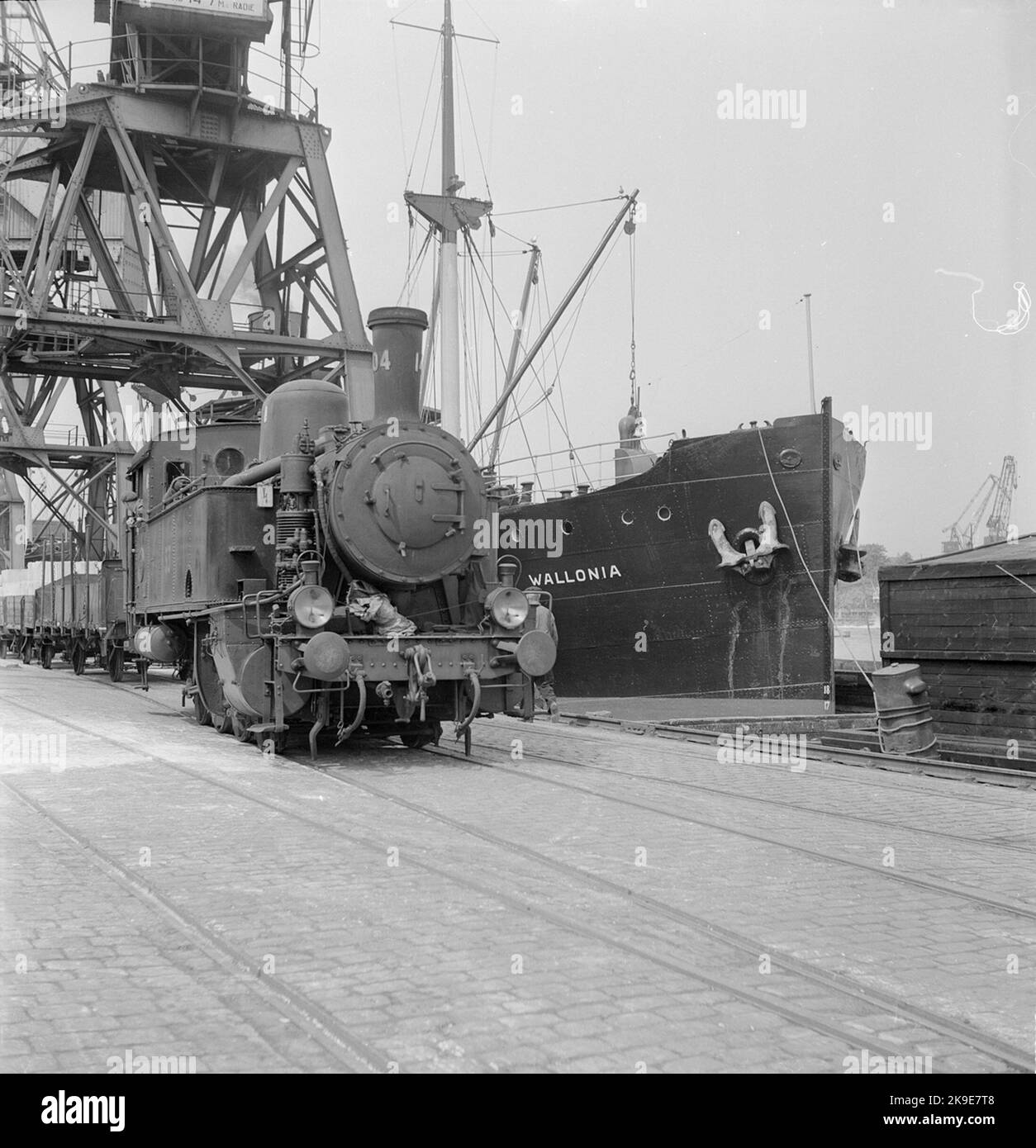 Steam locomotive seven in Gothenburg harbor. Freight vessels Wallonia ...