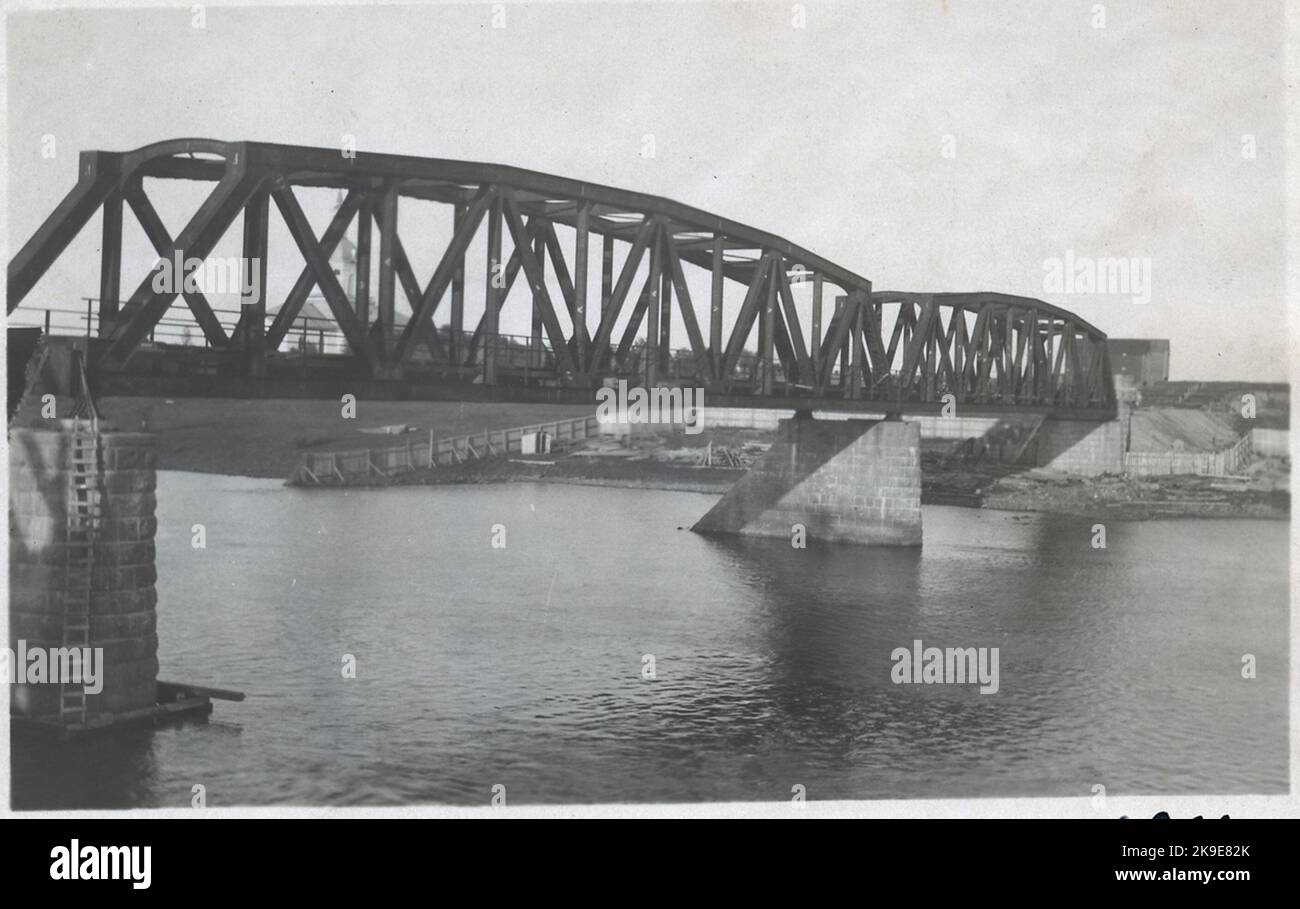 The railway bridge over the Torne River. Torneå church is glimpsed ...