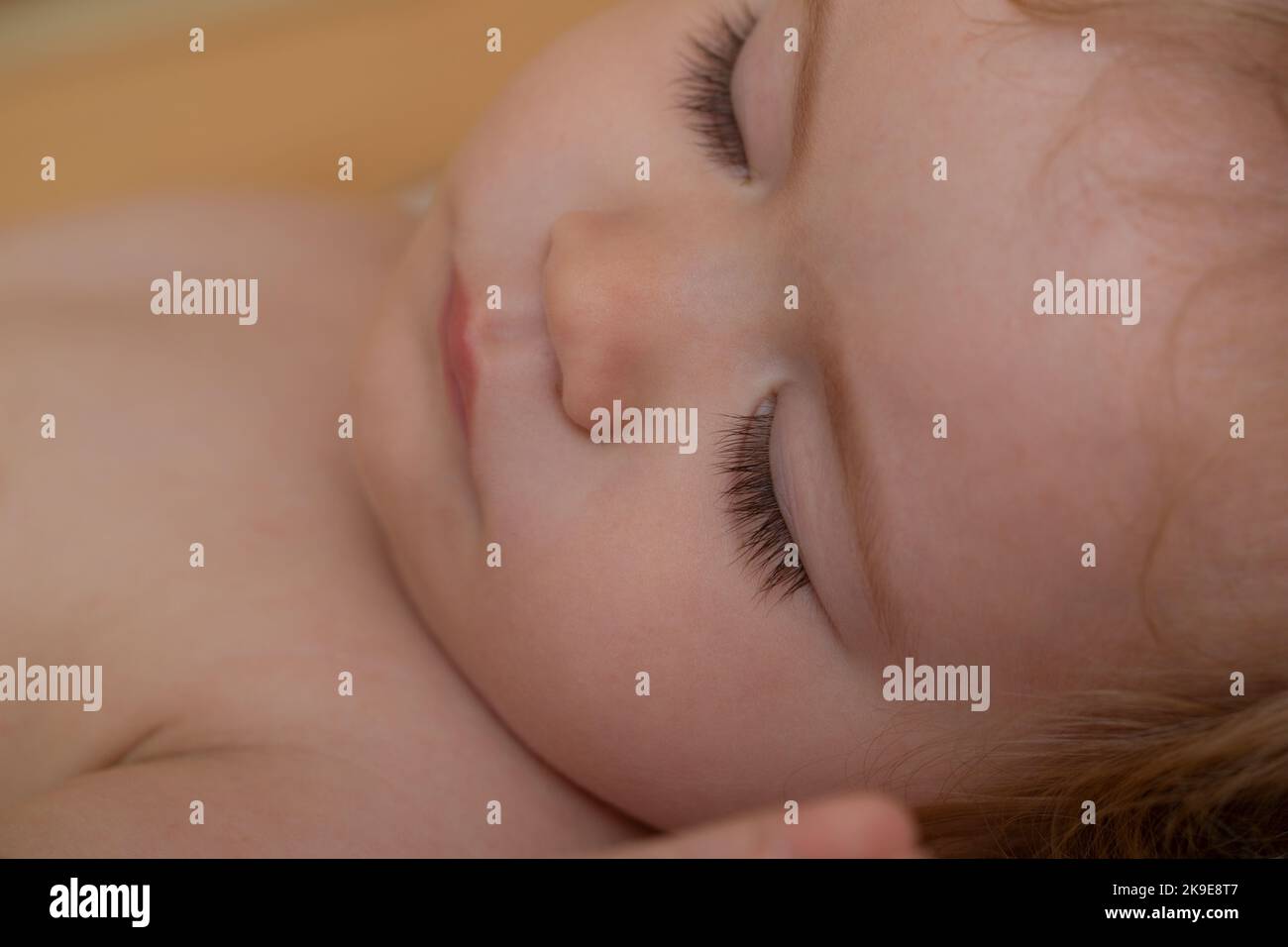 Close up face of baby child sleeping in the bed. Closeup sleepy kids portrait Stock Photo - Alamy
