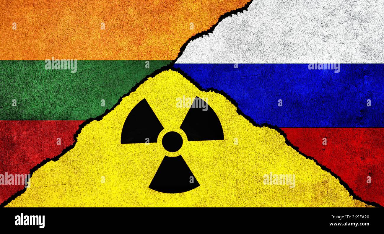 Flags of Russia, Lithuania and Nuclear symbol together on textured wall ...